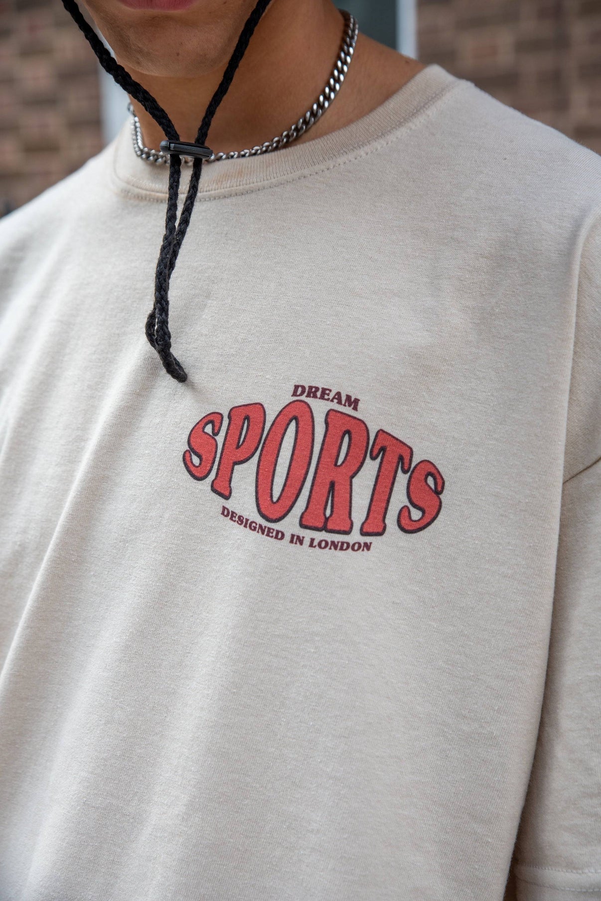 Short Sleeved T-shirt in Natural With Dream Sports Chest Print ...